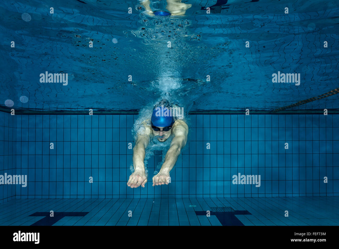 Action man in swimming pool hi-res stock photography and images - Alamy