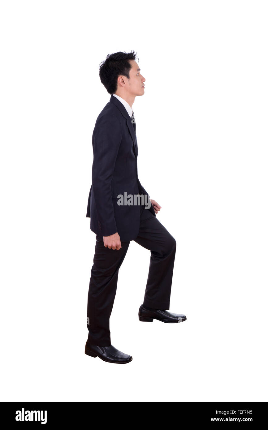 Side view of man in suit stepping up isolated on white background Stock ...