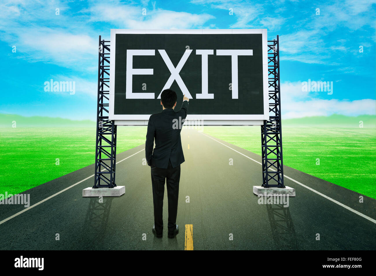 Exit sign man standing hi-res stock photography and images - Alamy