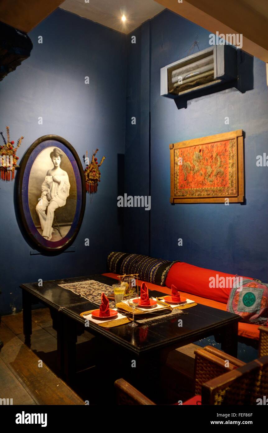 Exotic, rustic Asian themed dining room Stock Photo - Alamy