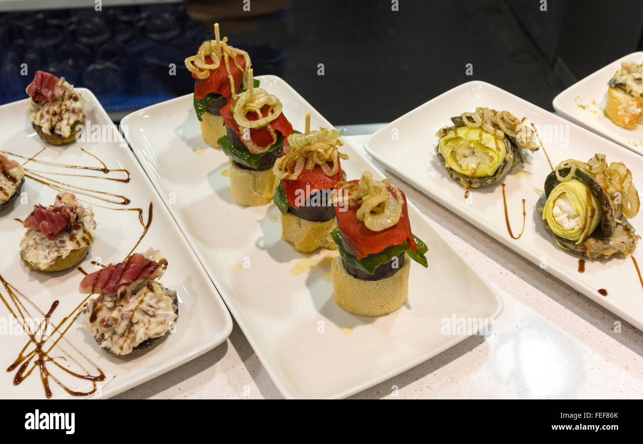 Pintxos or pinchos, a Basque food speciality Stock Photo - Alamy
