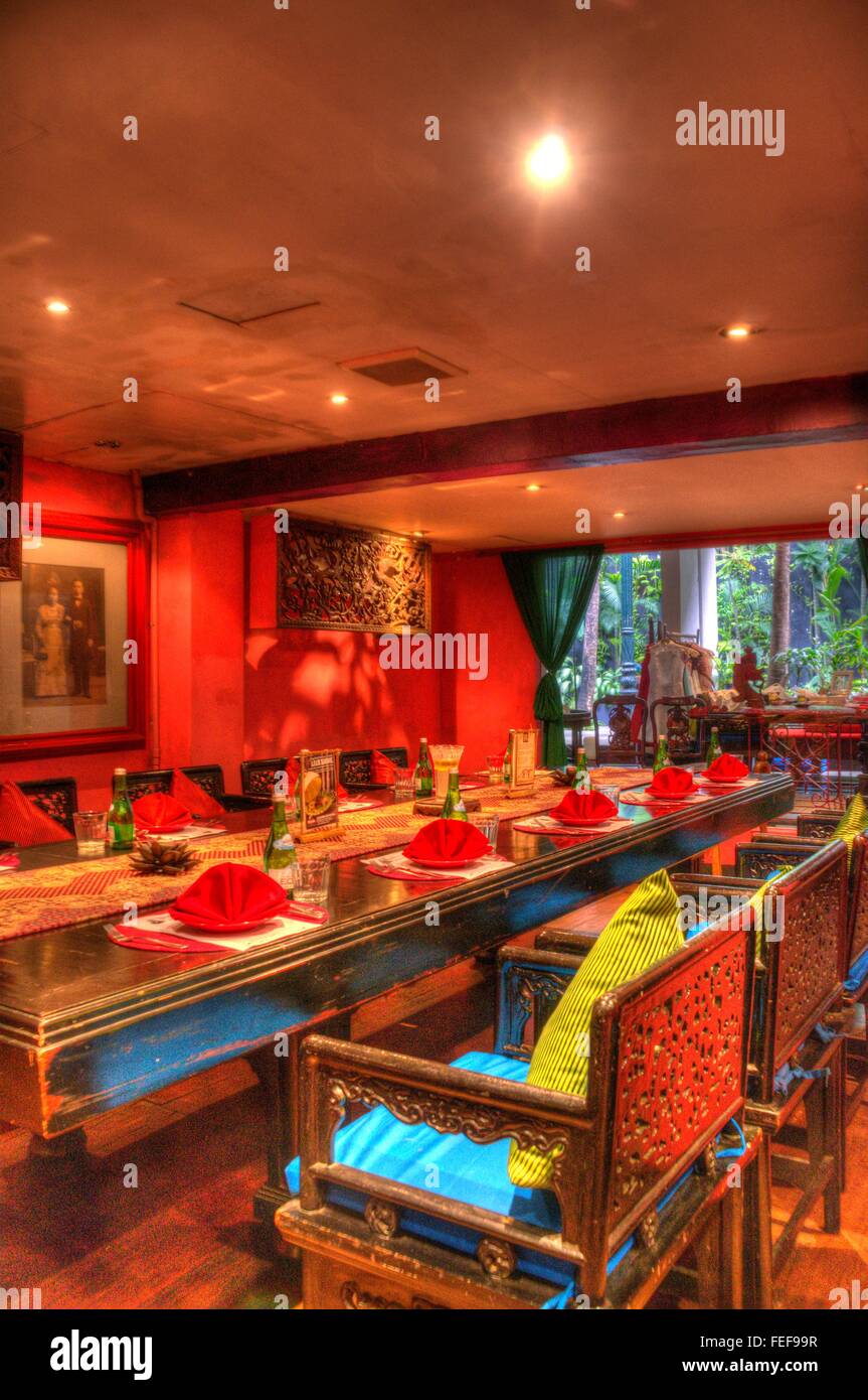 Exotic, rustic Asian themed dining room Stock Photo - Alamy