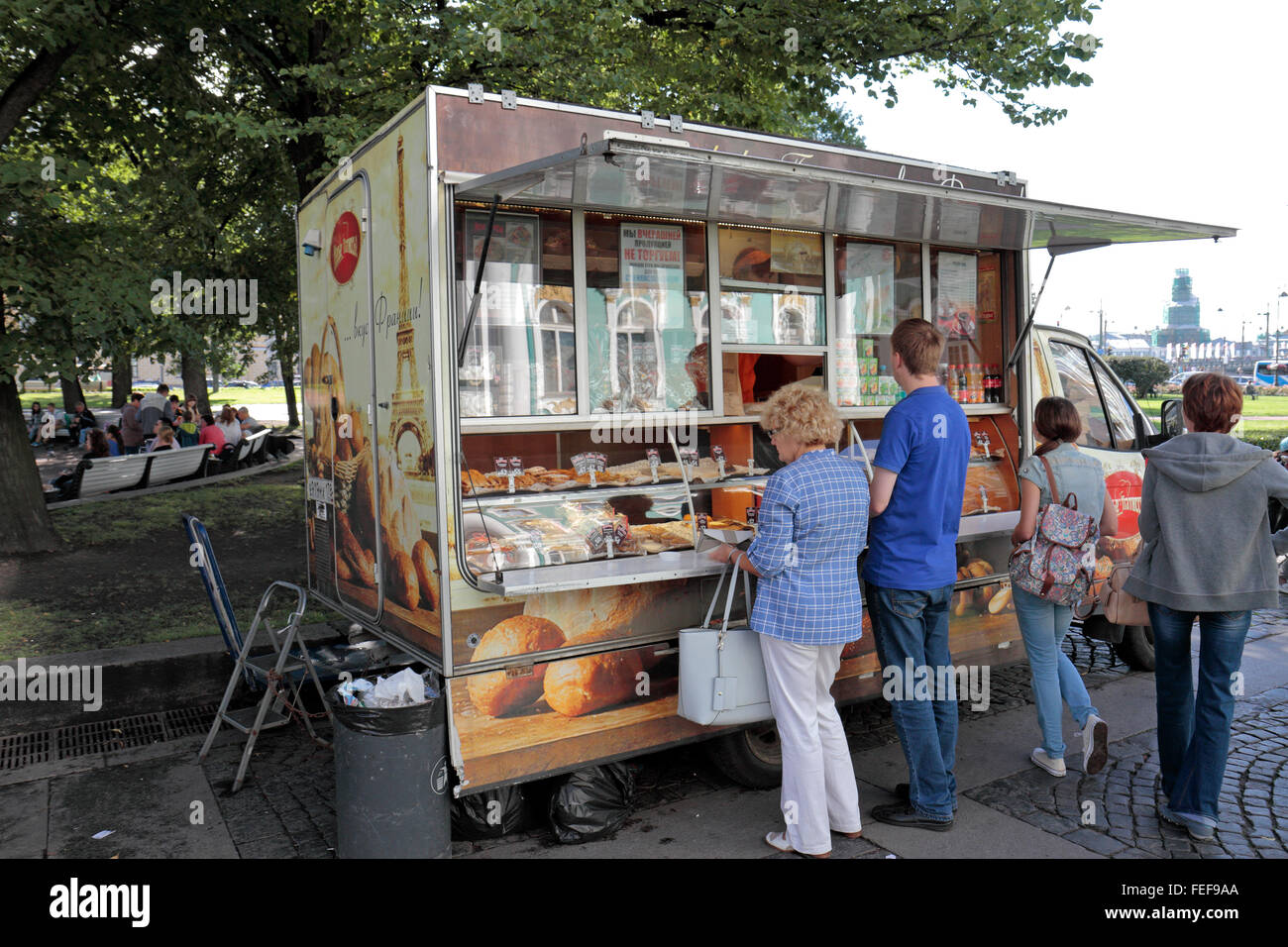 A mobile food stall with customers in St Petersburg, Russia Stock Photo ...