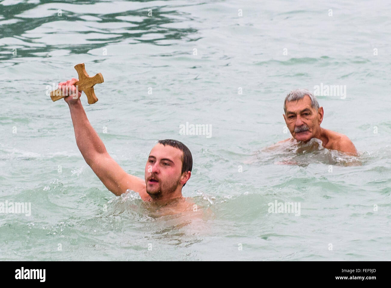 Bulgarians celebrate Epiphany with a swim in the icy waters of the ...