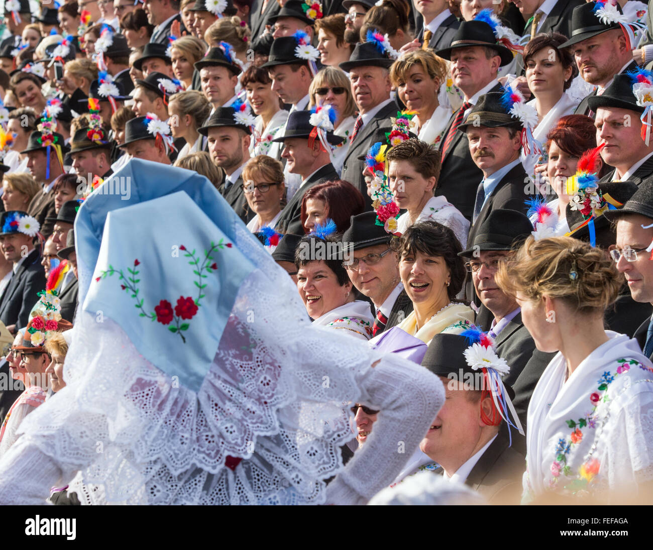 Couples in original Sorbian festivity costumes walking through the ...