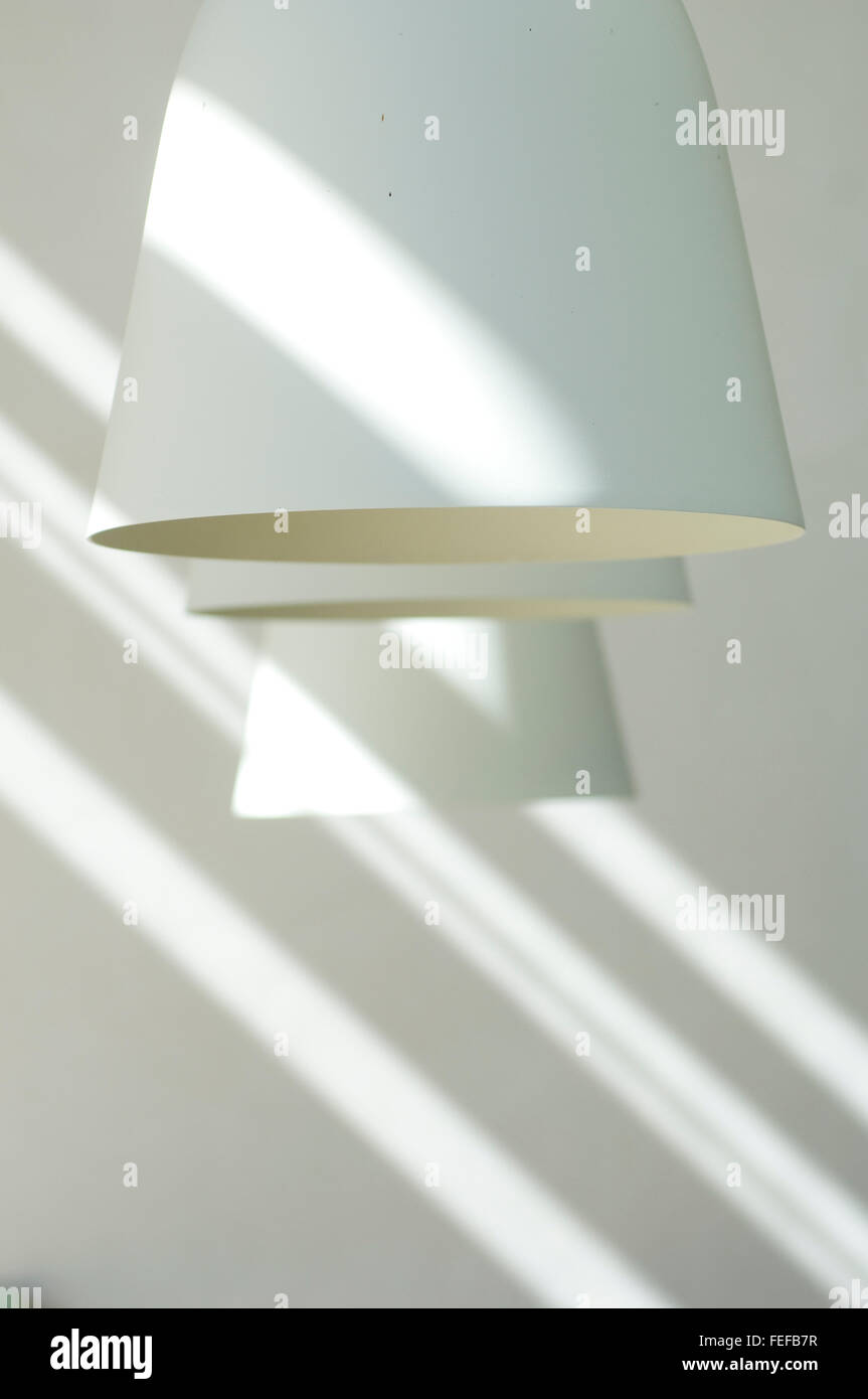Overhead table lighting, white on white, shadows Stock Photo - Alamy