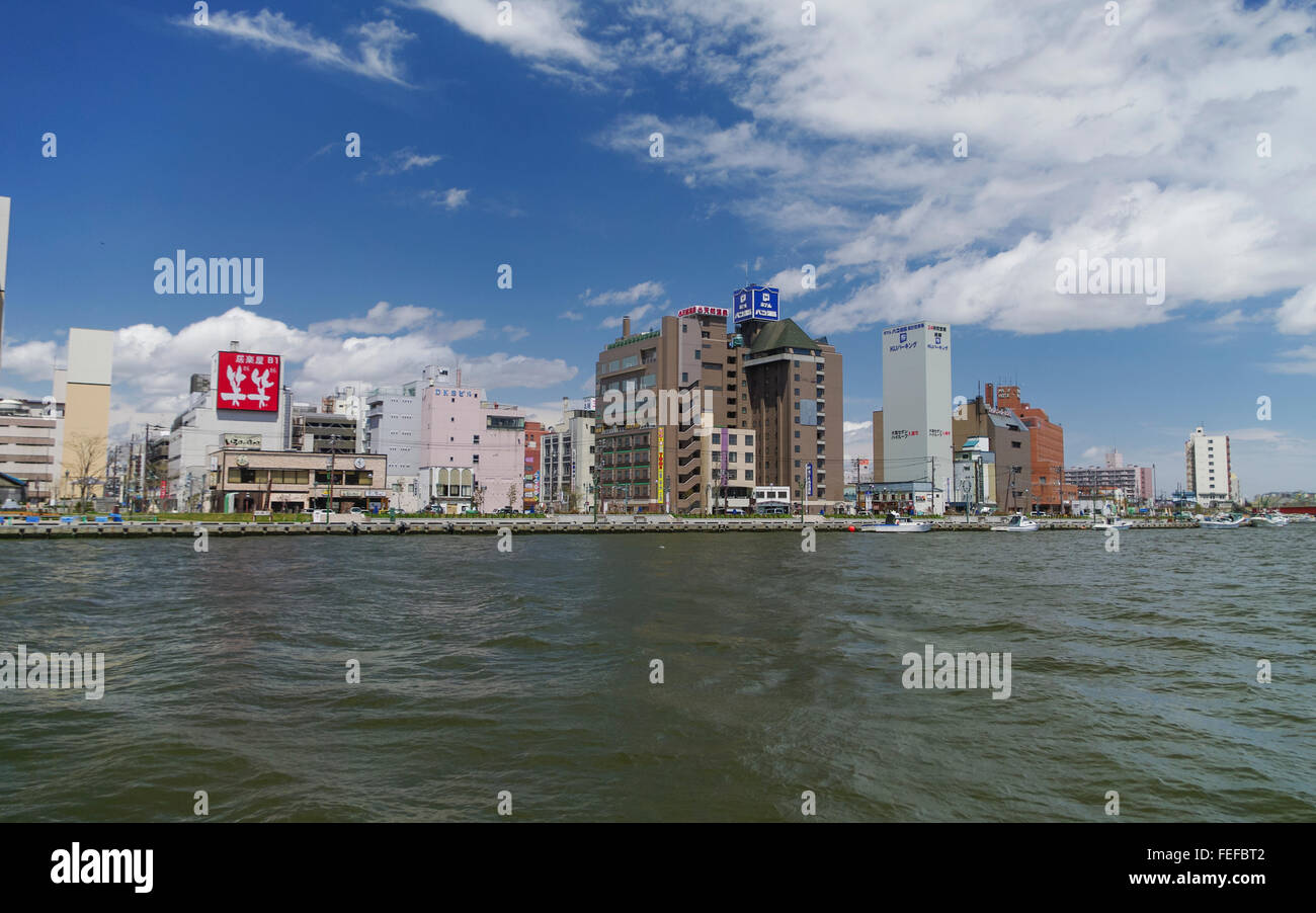 View over Kushiro river to buildings in downtown Kushiro, Hokkaidō ...