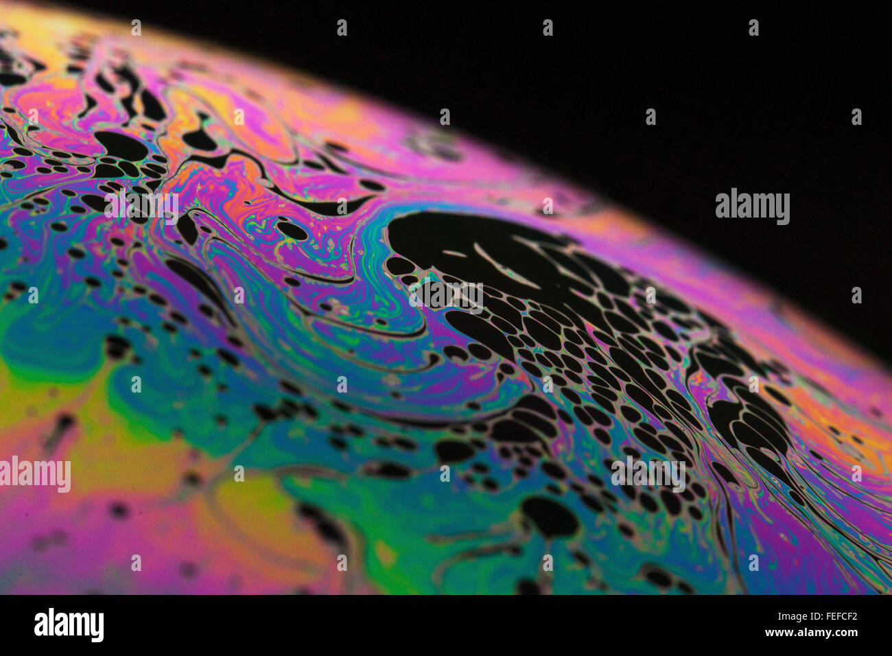 A glimpse of another colorful planet made with the pattern of a soap ...