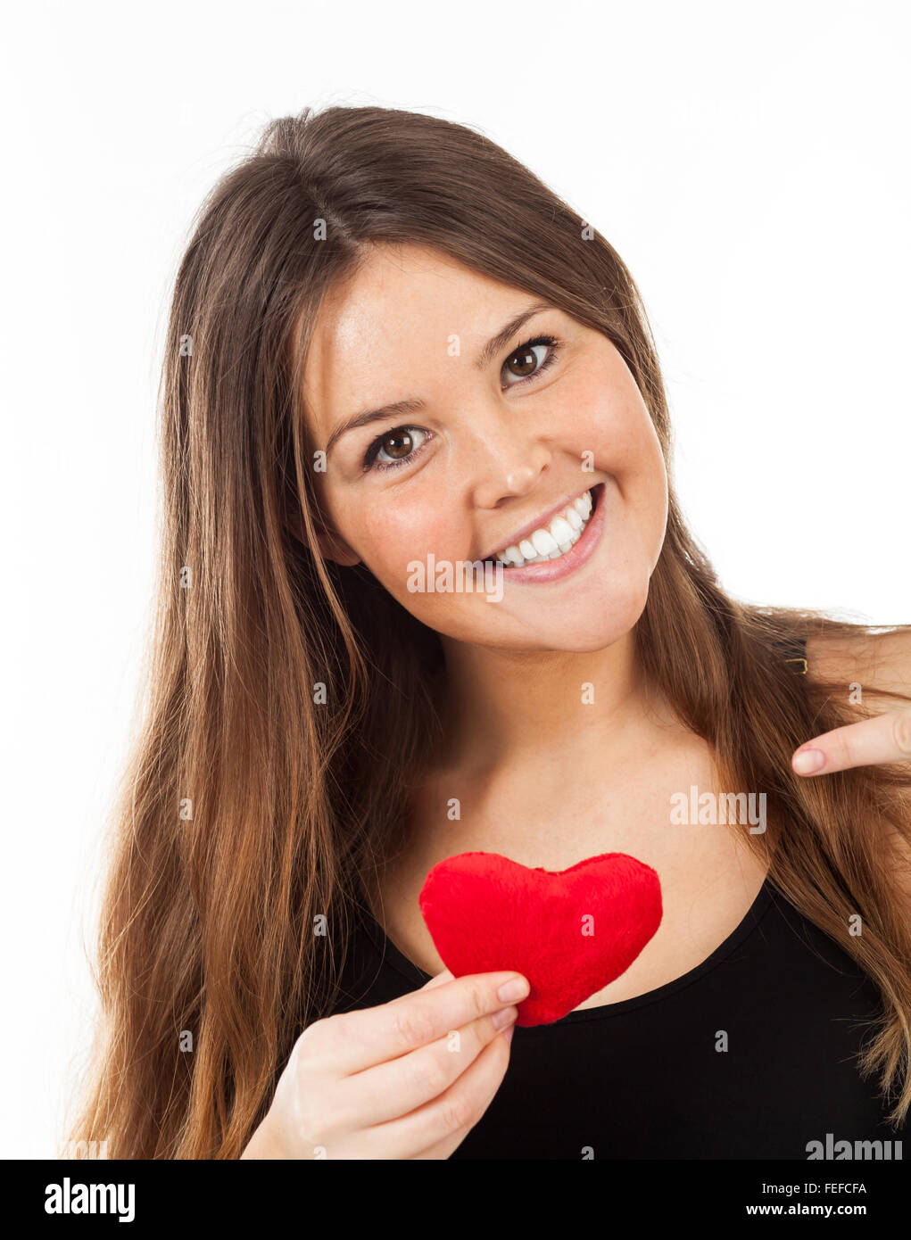 young woman in love with a heart in hand Stock Photo - Alamy
