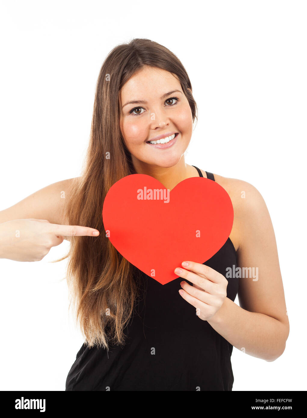 young woman in love with a heart in hand Stock Photo - Alamy