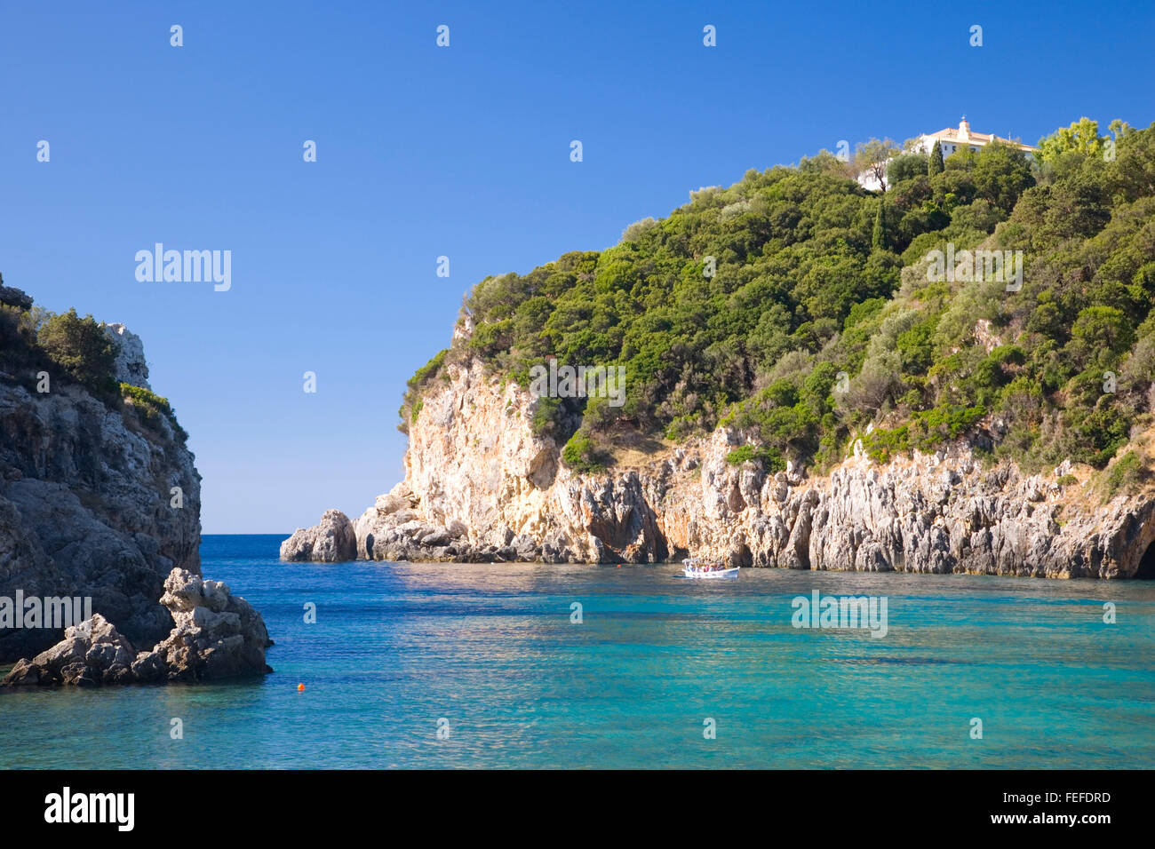 Paleokastritsa, Corfu, Ionian Islands, Greece. View across tranquil ...