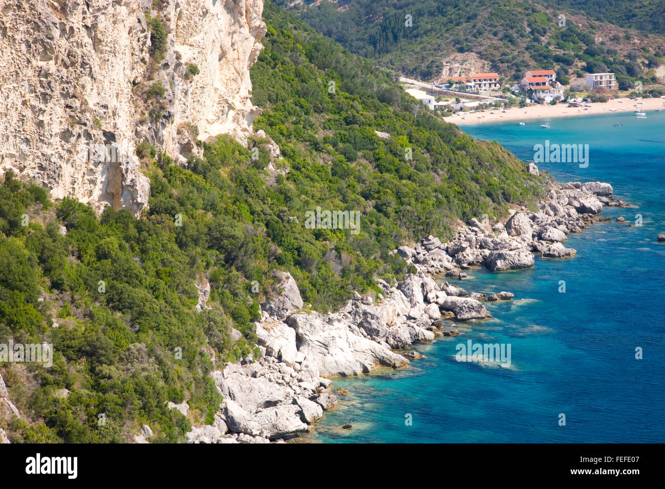 Afionas, Corfu, Ionian Islands, Greece. View along rocky coastline ...
