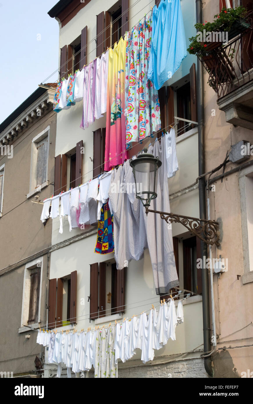 Drying laundry in the Italian residential house Stock Photo - Alamy