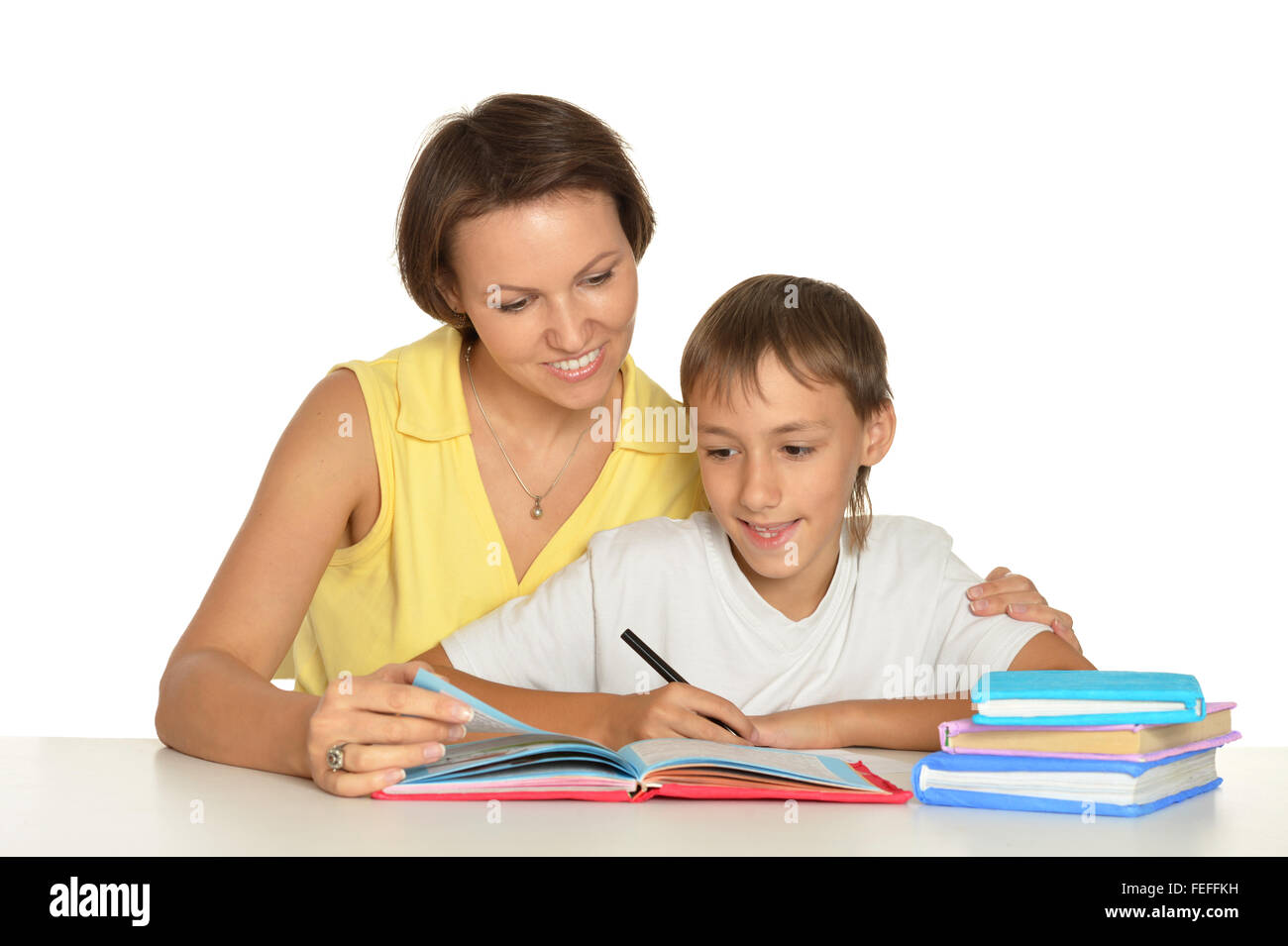 Mother and son doing homework Stock Photo - Alamy
