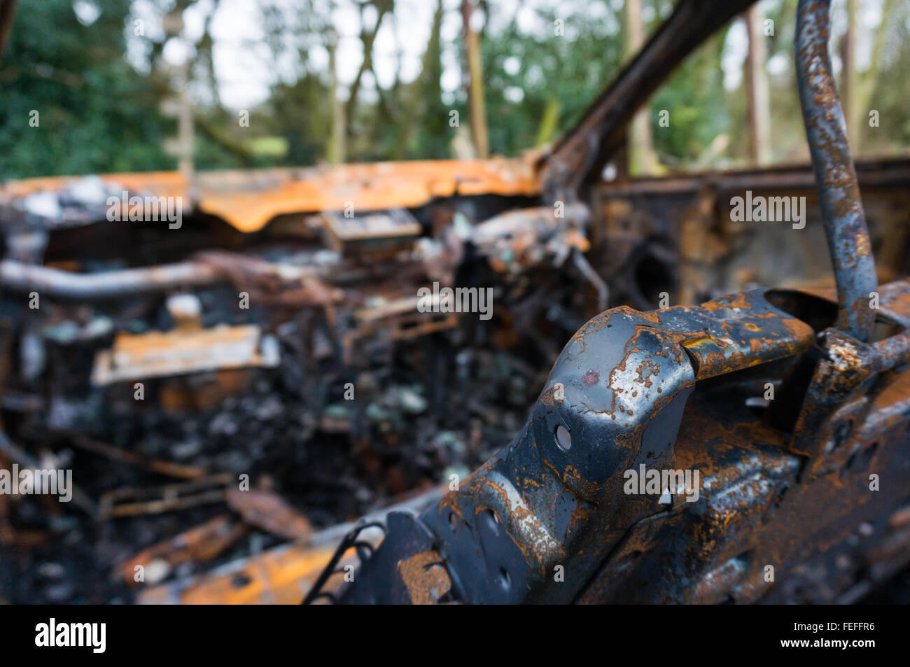 Abandoned fire damaged car Stock Photo - Alamy