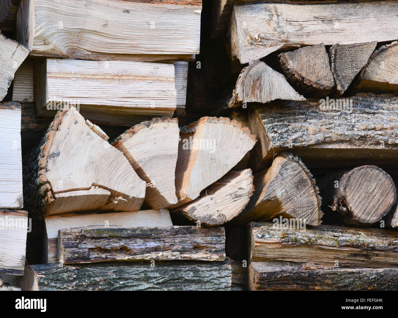 stacked split wood background Stock Photo - Alamy