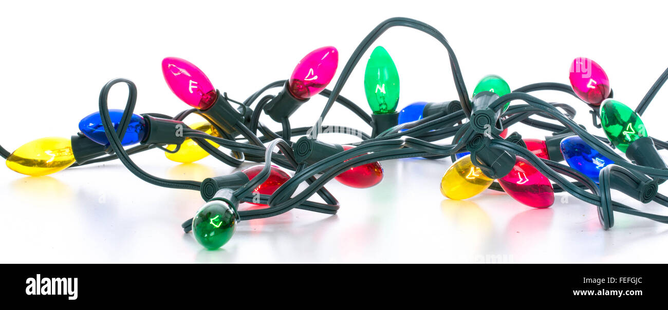 colorful tangled christmas lights on white background Stock Photo - Alamy