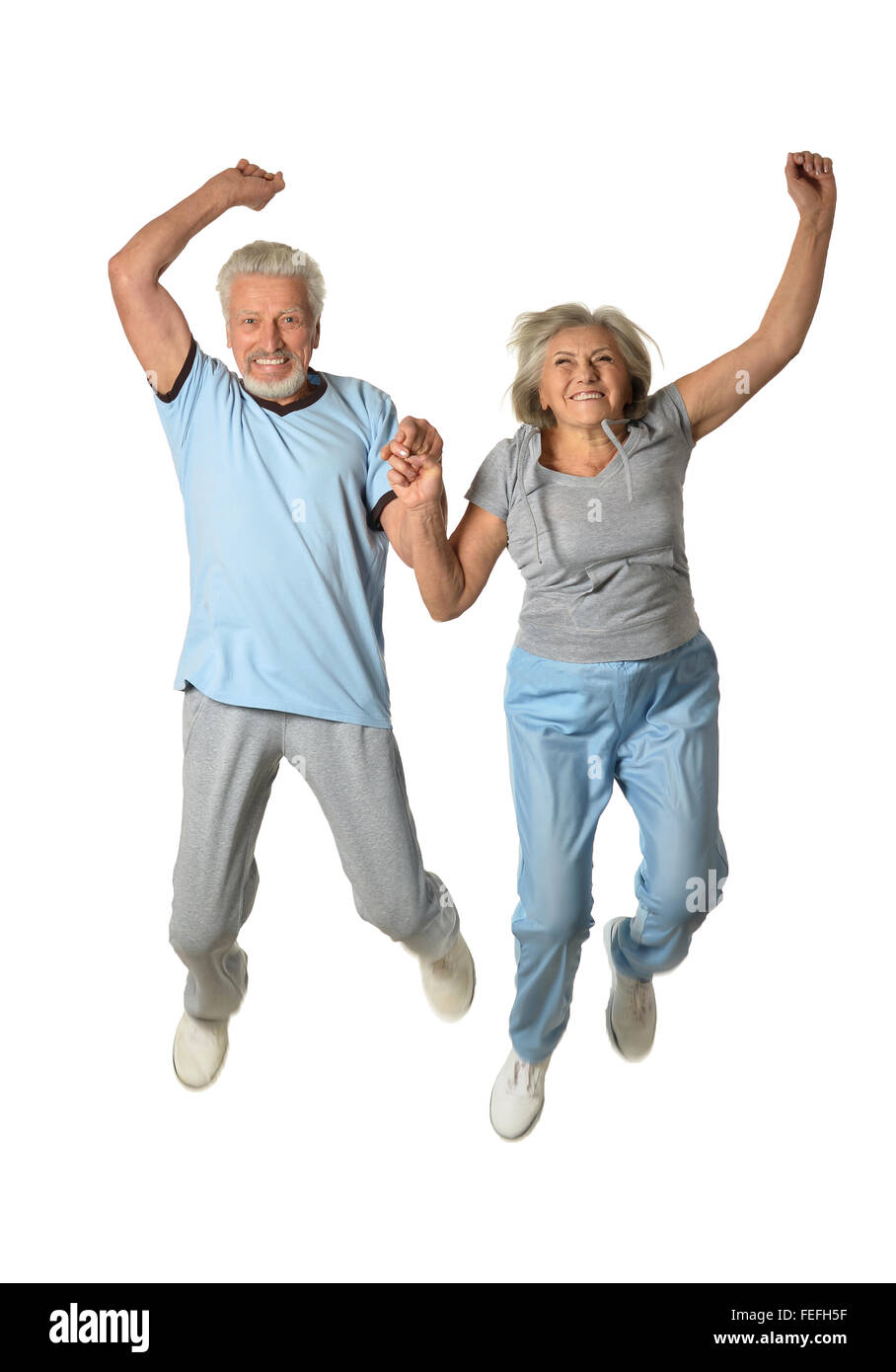 Old lady jumping white background Cut Out Stock Images & Pictures - Alamy