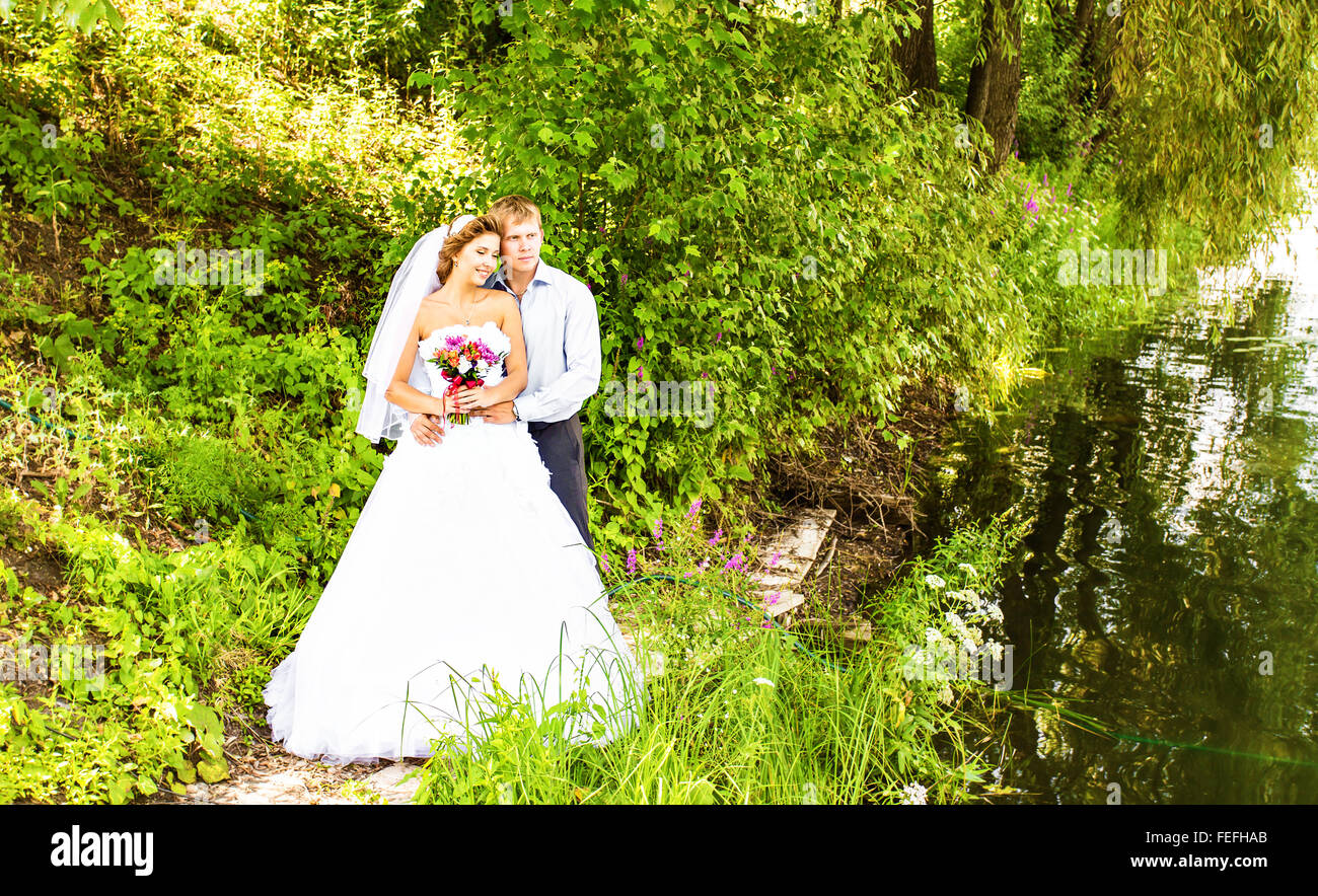 Happy bride and groom on their wedding Stock Photo - Alamy