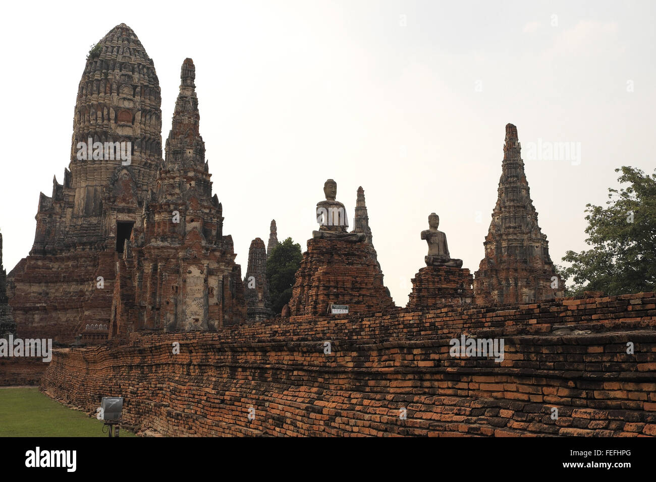 Central prang, ruined chedi-shaped chapels and Buddha statues, Wat ...