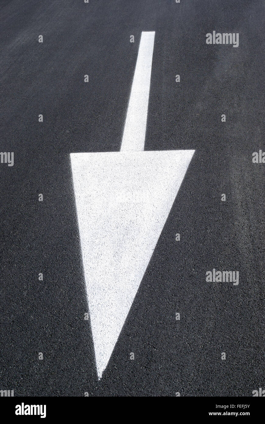 Arrow marking on road Stock Photo - Alamy