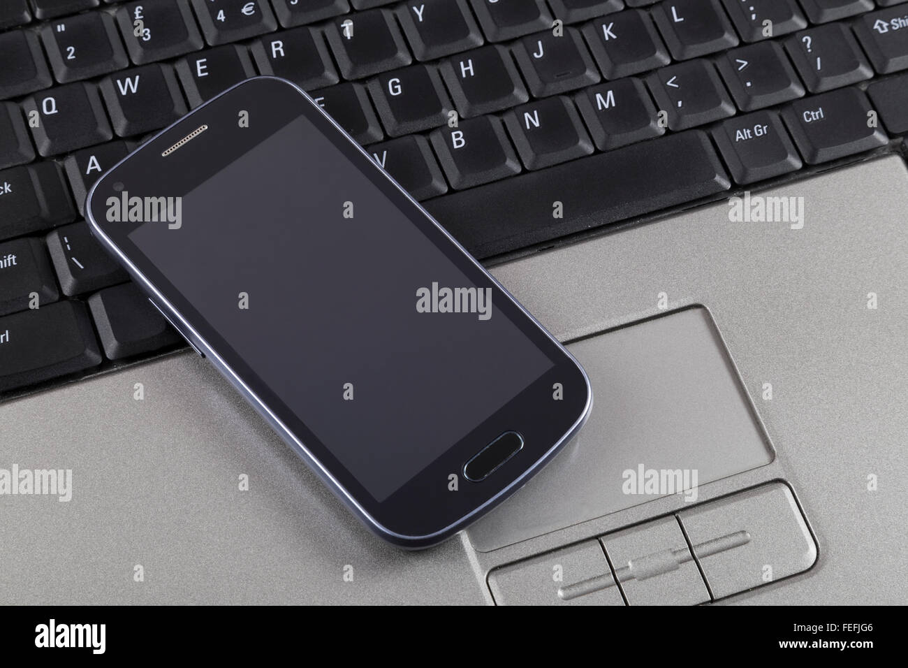 Smartphone laptop hi-res stock photography and images - Alamy