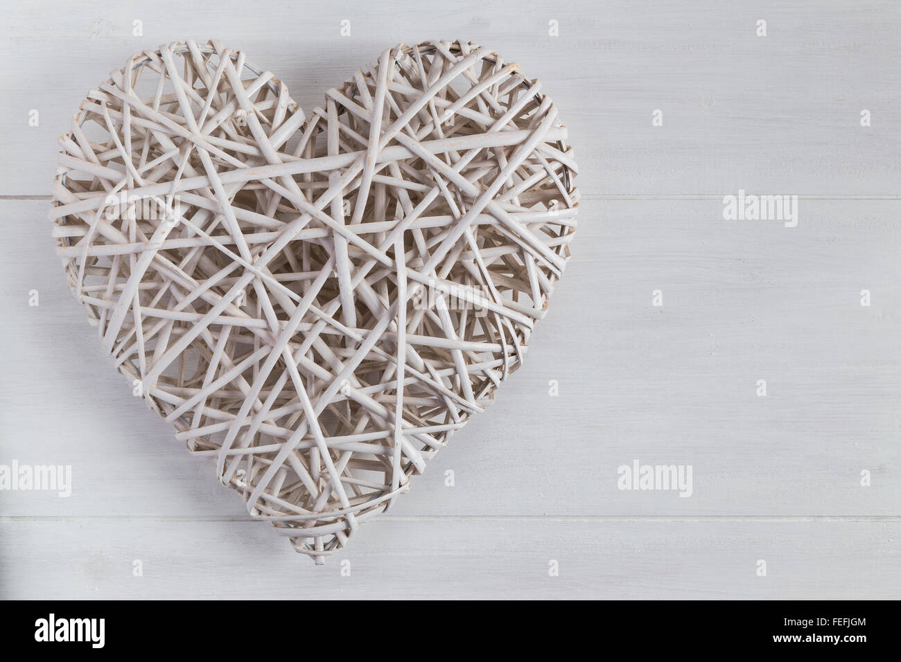 White wicker heart Stock Photo - Alamy
