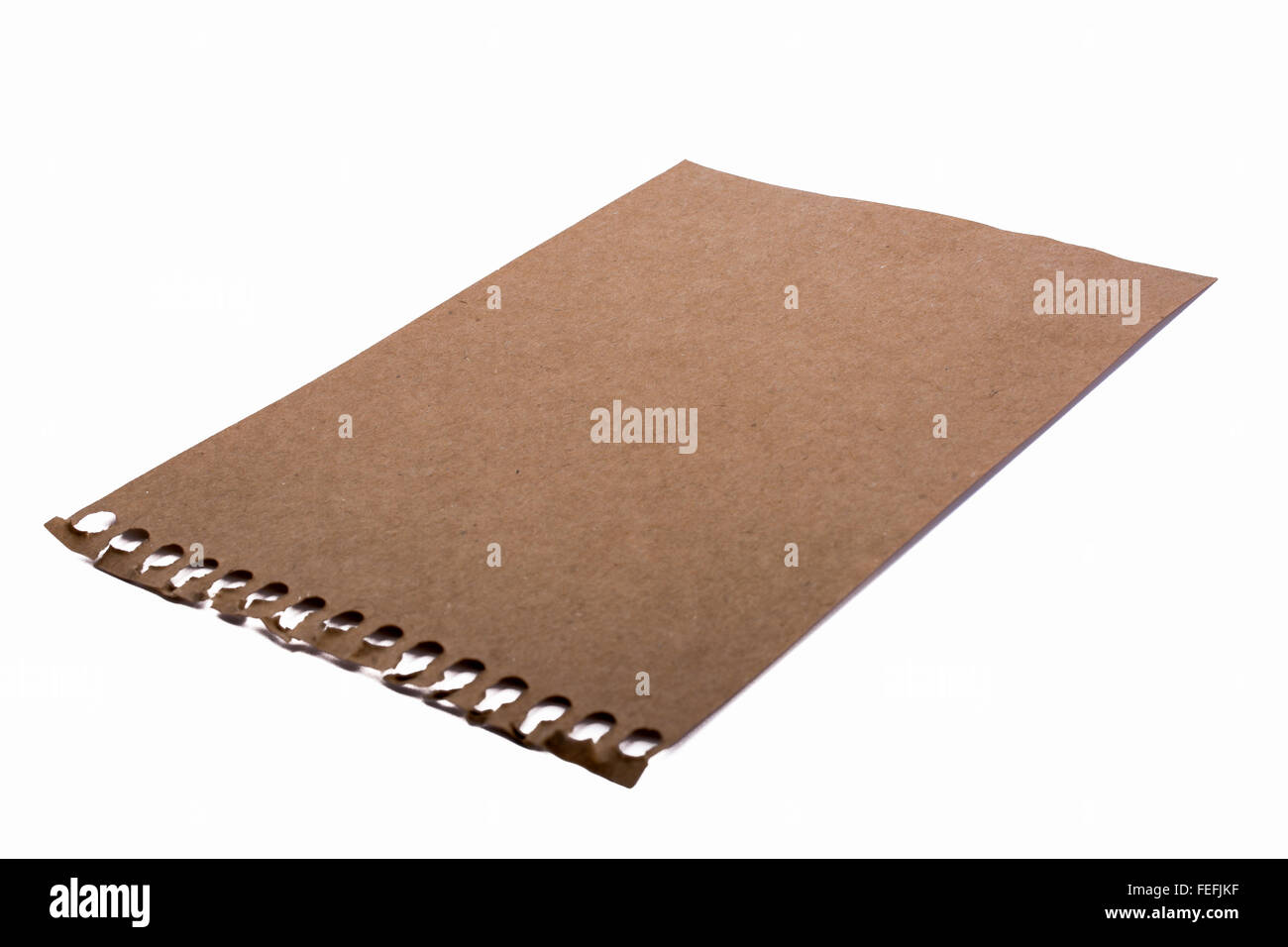 Sheet of brown torn notepaper on a white background Stock Photo - Alamy