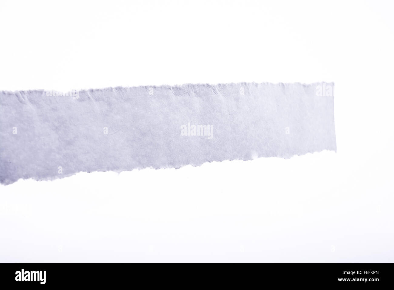 a piece of white blank torn note paper Stock Photo - Alamy