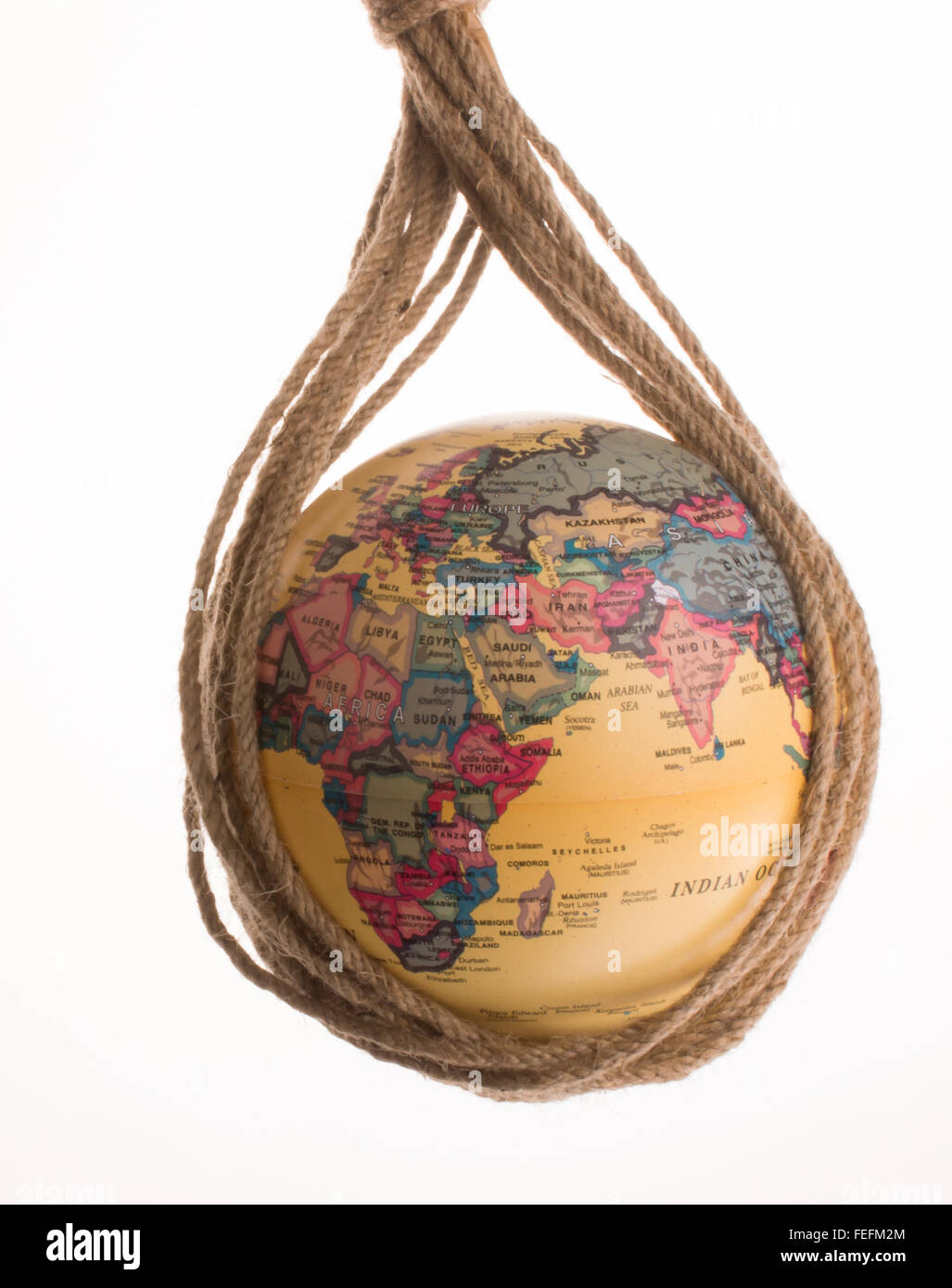 globe hanging in rope on white background Stock Photo - Alamy