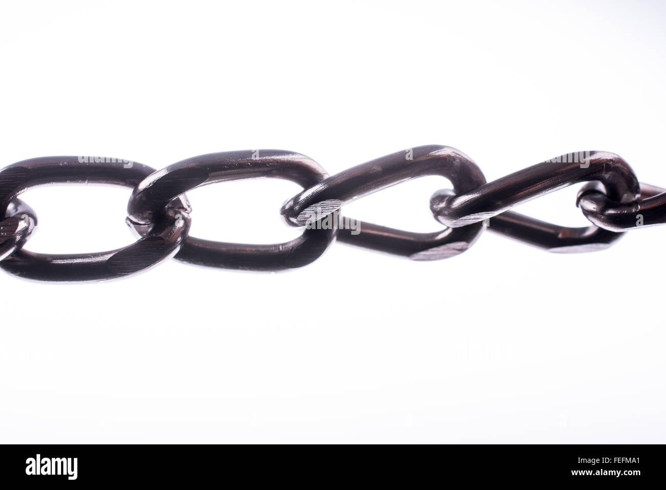 metal chain on white background Stock Photo - Alamy