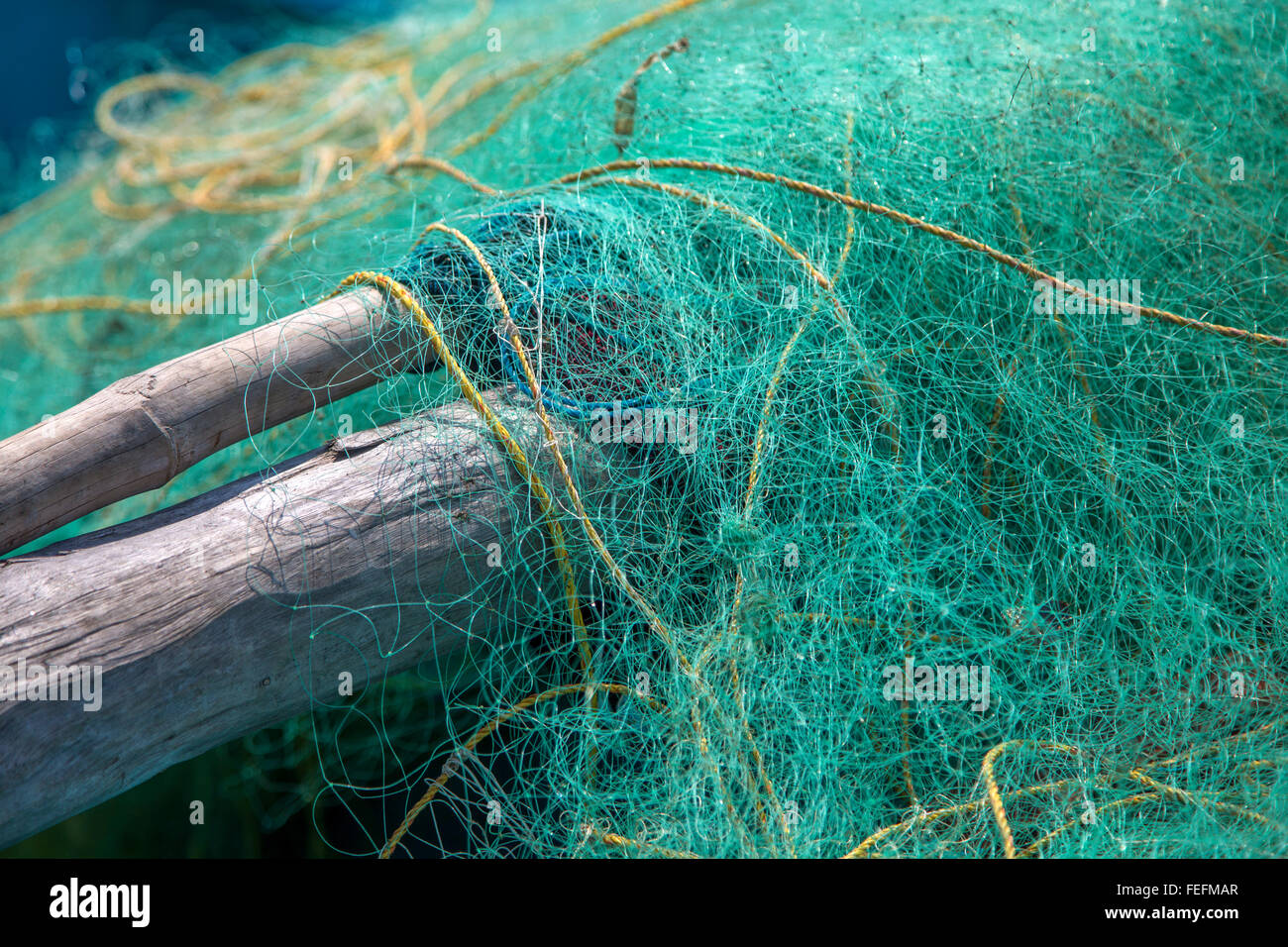 Closeup view at the fishing net Stock Photo - Alamy
