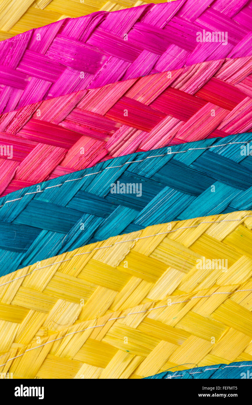 Abstract colorful background of woven straw Stock Photo - Alamy