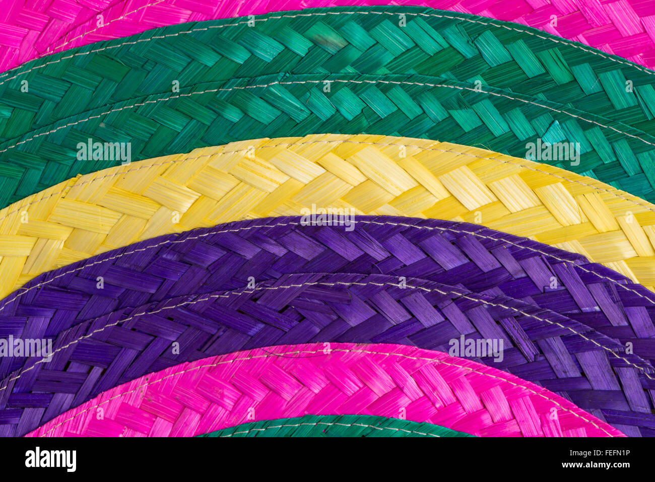 Abstract colorful background of woven straw Stock Photo - Alamy