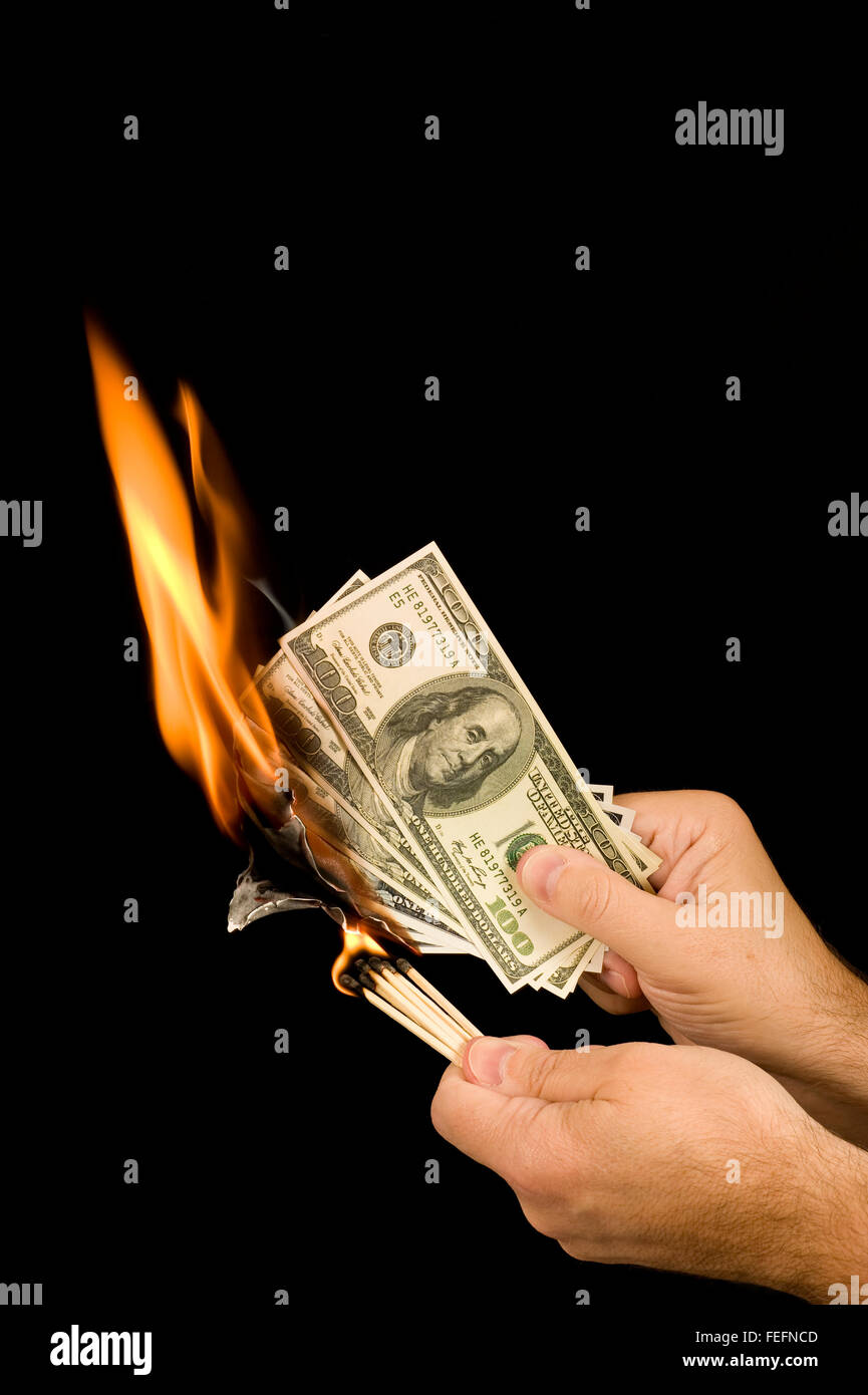 Burning money hi-res stock photography and images - Alamy