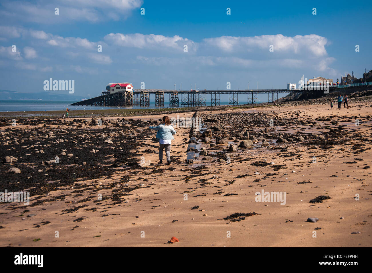 Mumbles Pier and lifeboat station at low tide Stock Photo - Alamy