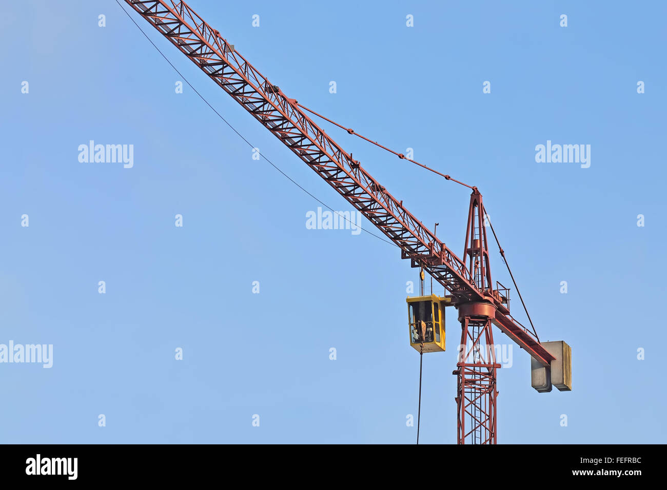 Construction crane closeup on sky background Stock Photo - Alamy