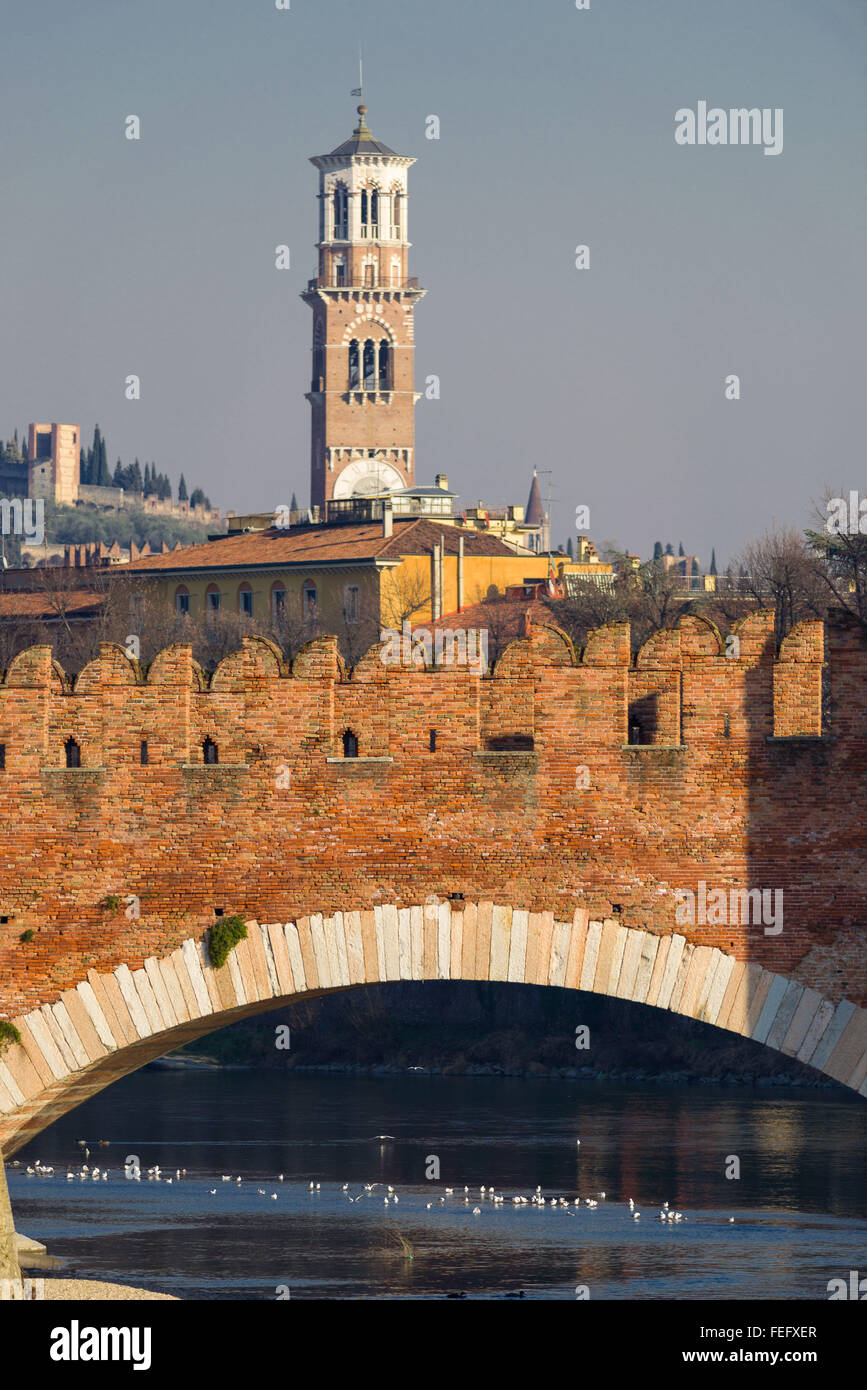 View over the medieval bridge and tower in Verona Stock Photo - Alamy