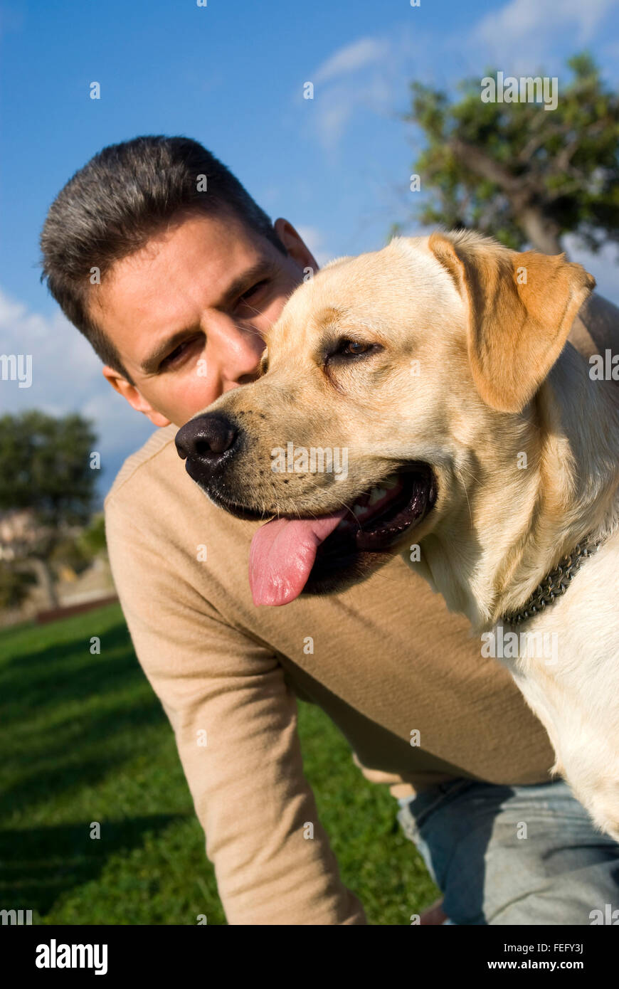 Man and his Labrador Stock Photo - Alamy