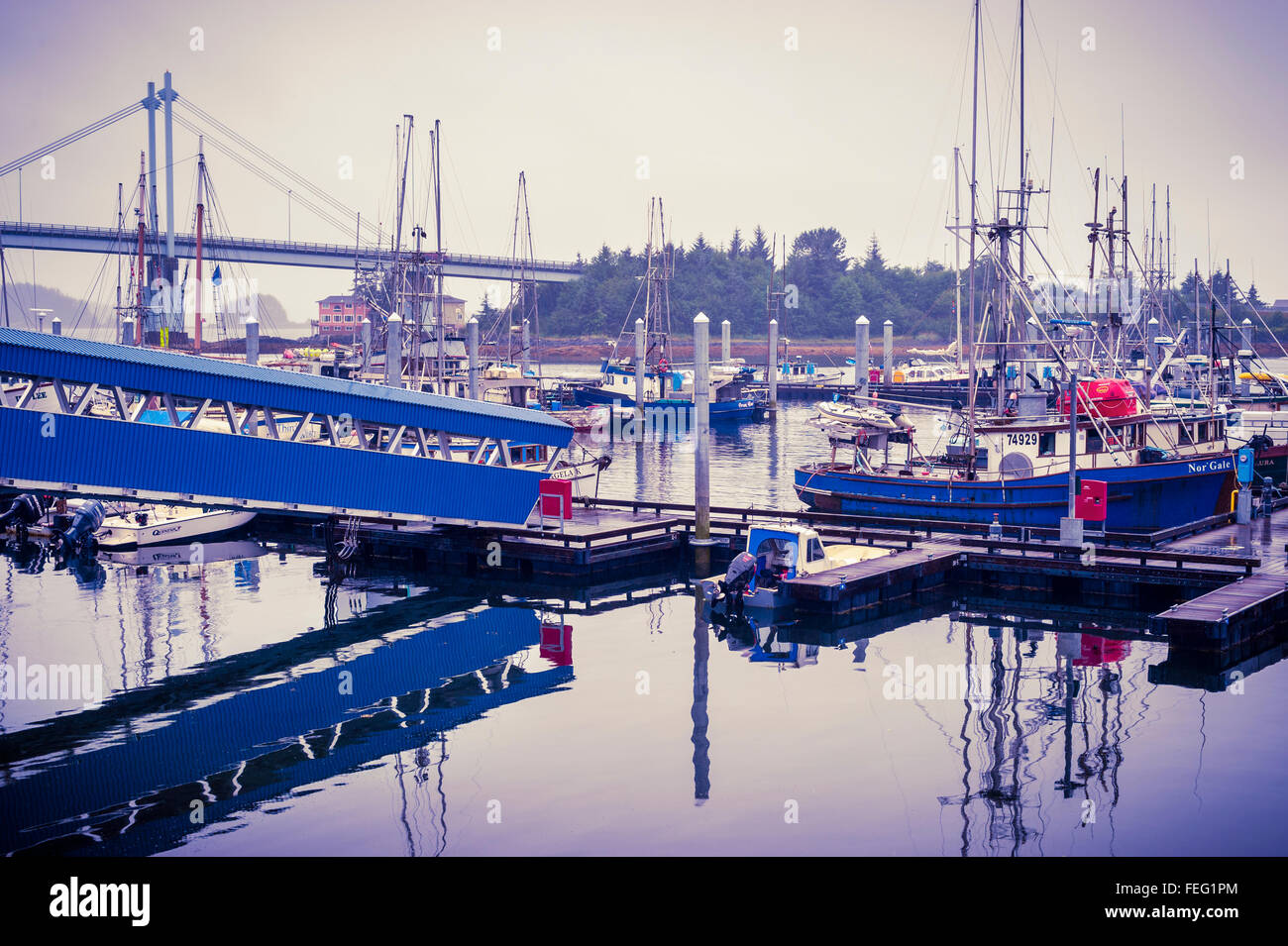 ANB Harbor scene on a dark and foggy afternoon in Sitka, Alaska, USA. O ...