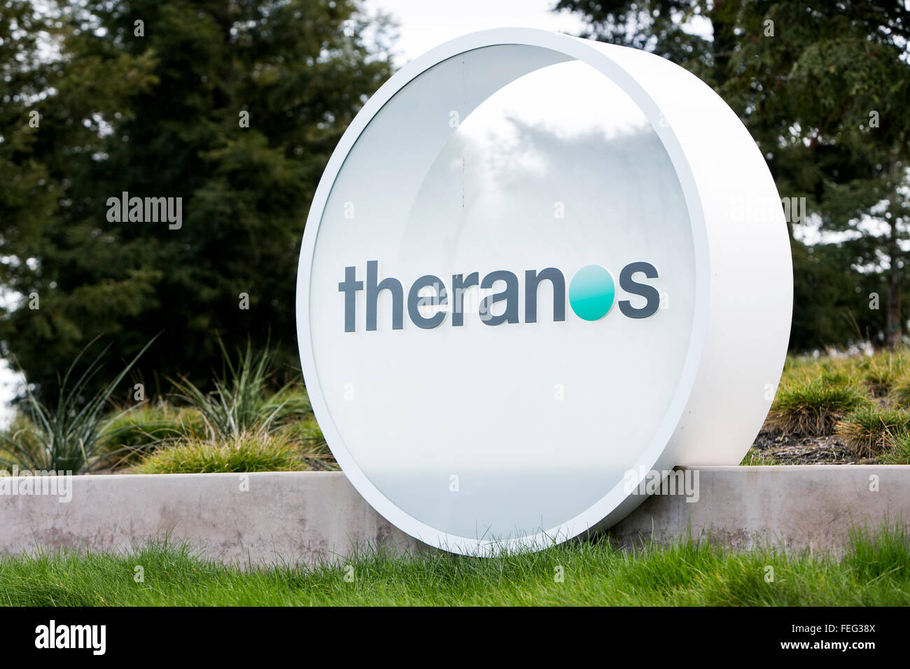 A logo sign outside of the headquarters of Theranos in Palo Alto ...