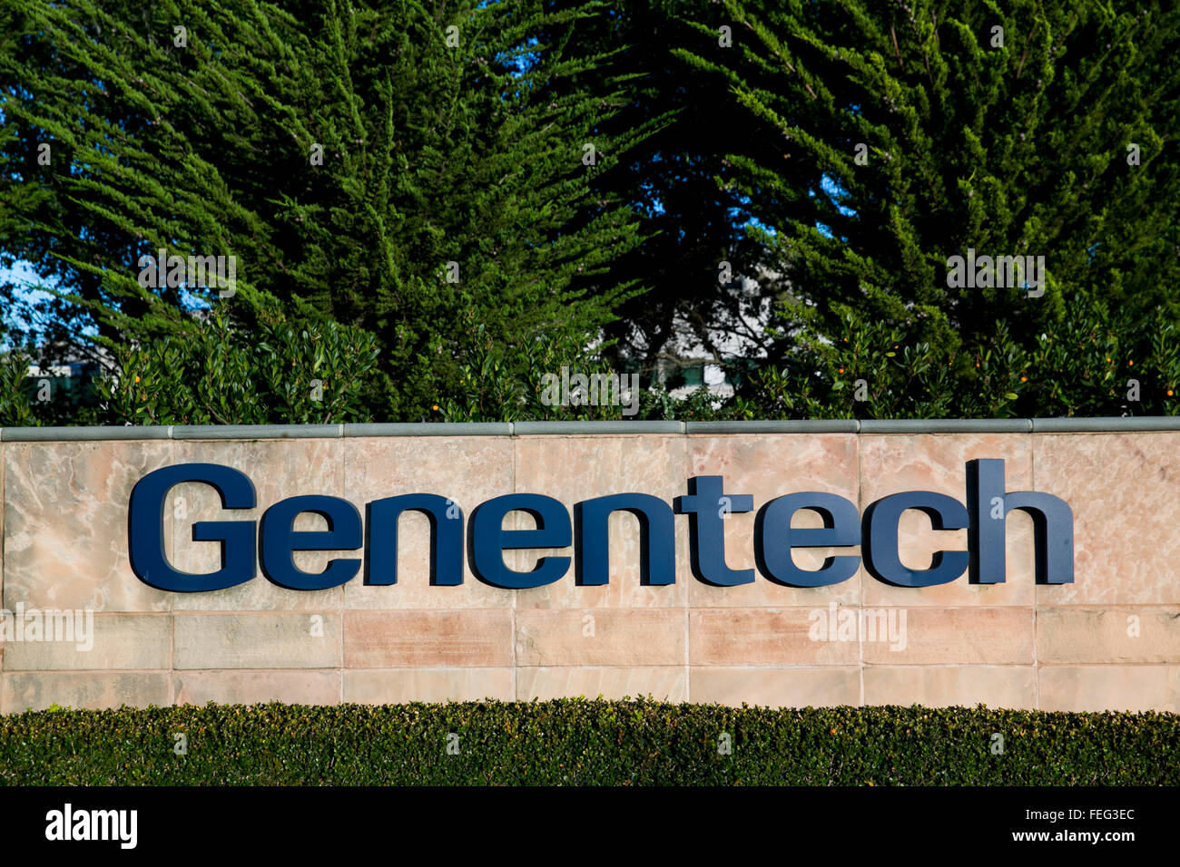 A logo sign outside of the headquarters of Genentech in South San ...