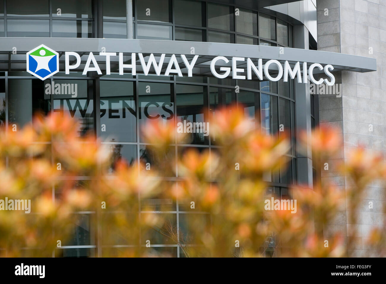 A logo sign outside of the headquarters of Pathway Genomics in San ...