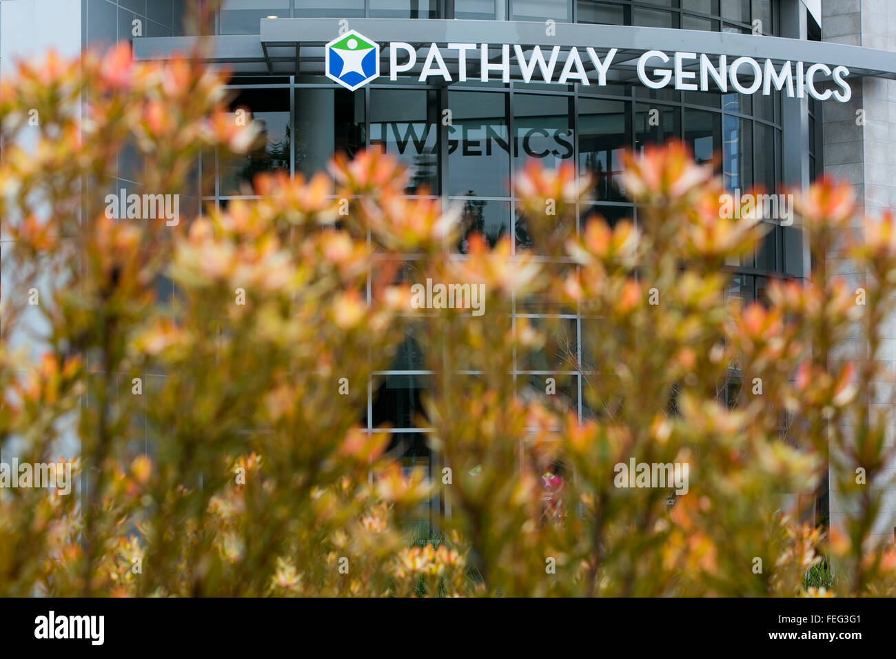 A logo sign outside of the headquarters of Pathway Genomics in San ...