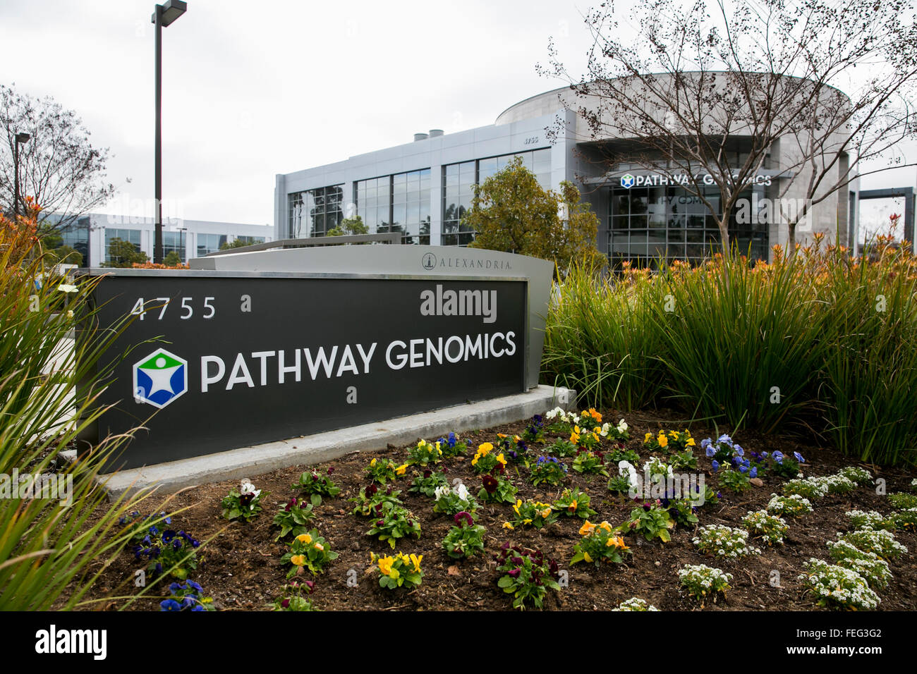 A logo sign outside of the headquarters of Pathway Genomics in San ...