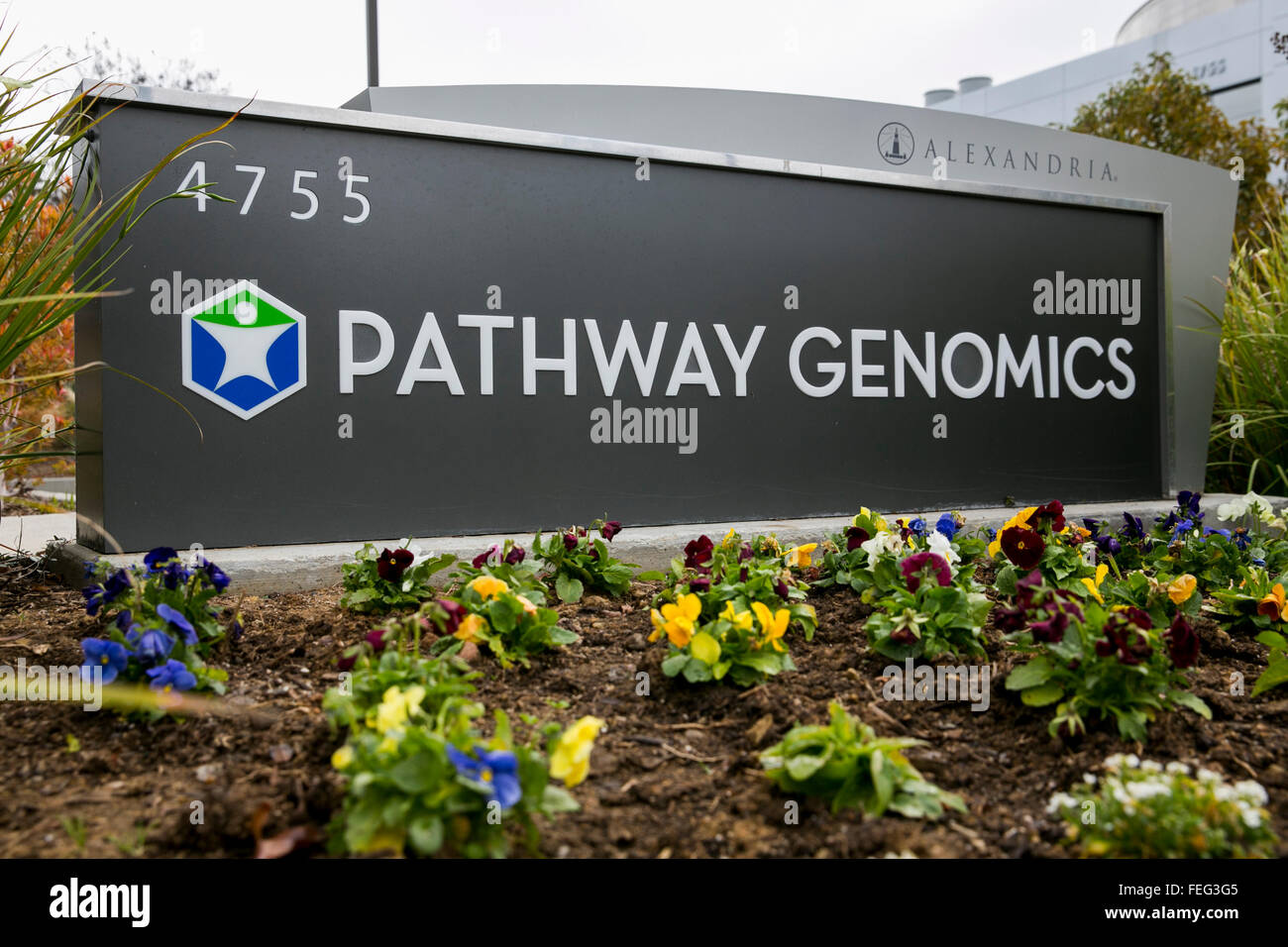 A logo sign outside of the headquarters of Pathway Genomics in San ...