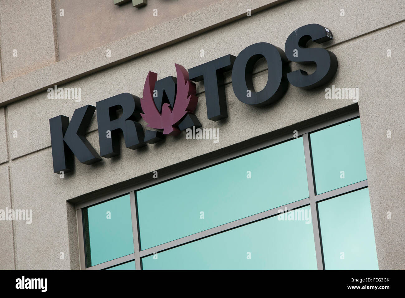 A logo sign outside of the headquarters of Kratos in San Diego ...