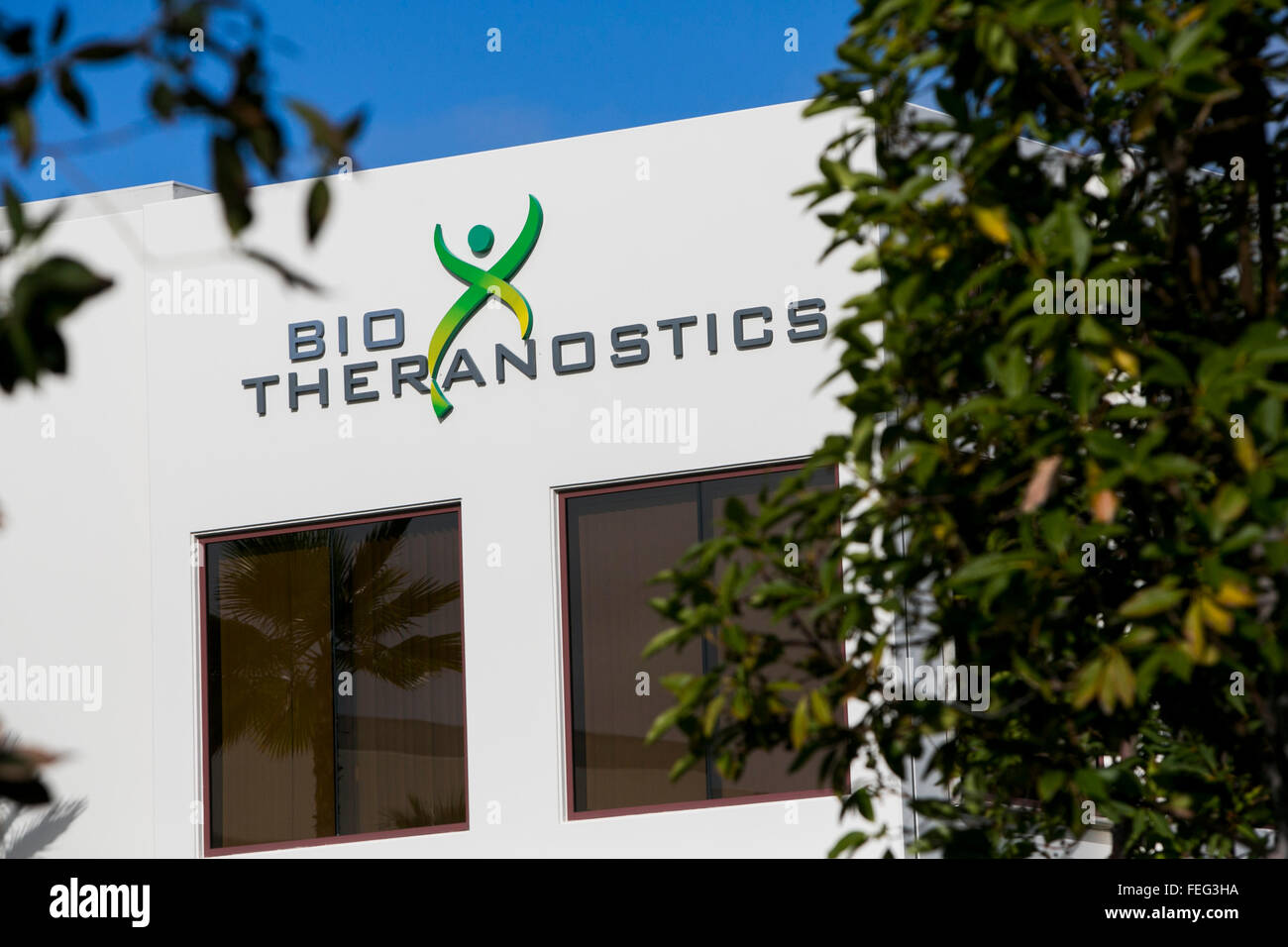 A logo sign outside of the headquarters of BioTheranostics in San Diego ...