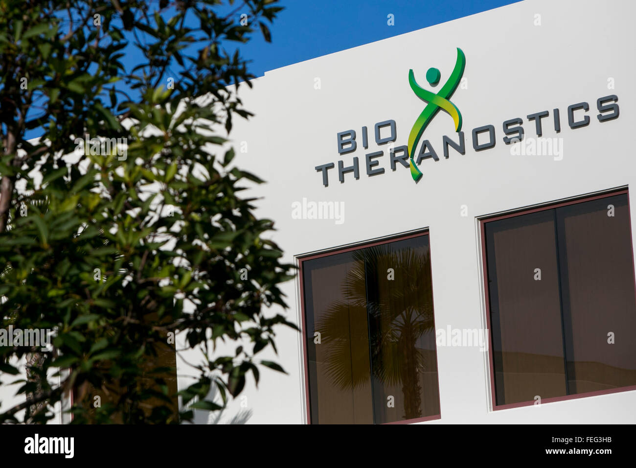 A logo sign outside of the headquarters of BioTheranostics in San Diego ...