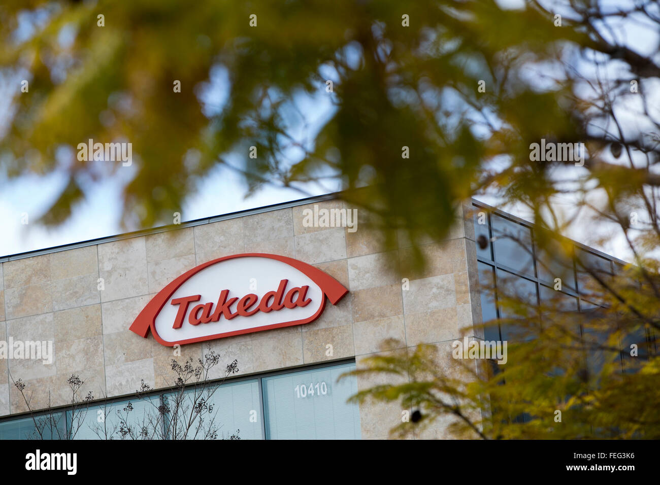 A logo sign outside of a facility occupied by the Takeda Pharmaceutical ...